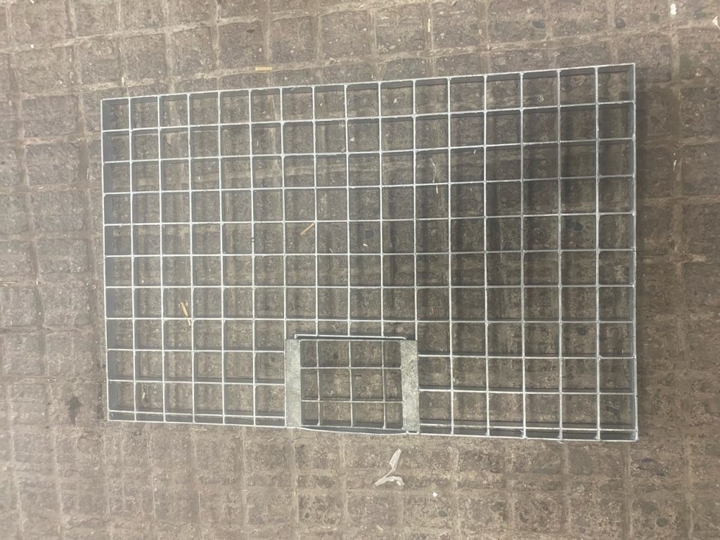 Heavy duty rectangular steel grid with removeable pump access hatch ...
